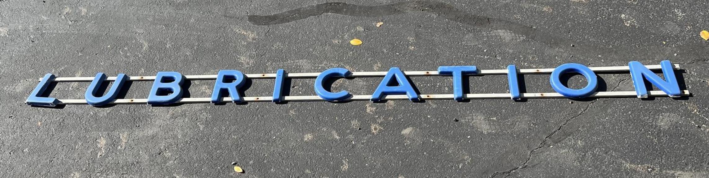 Auction Ohio | Vintage Lubrication Sign